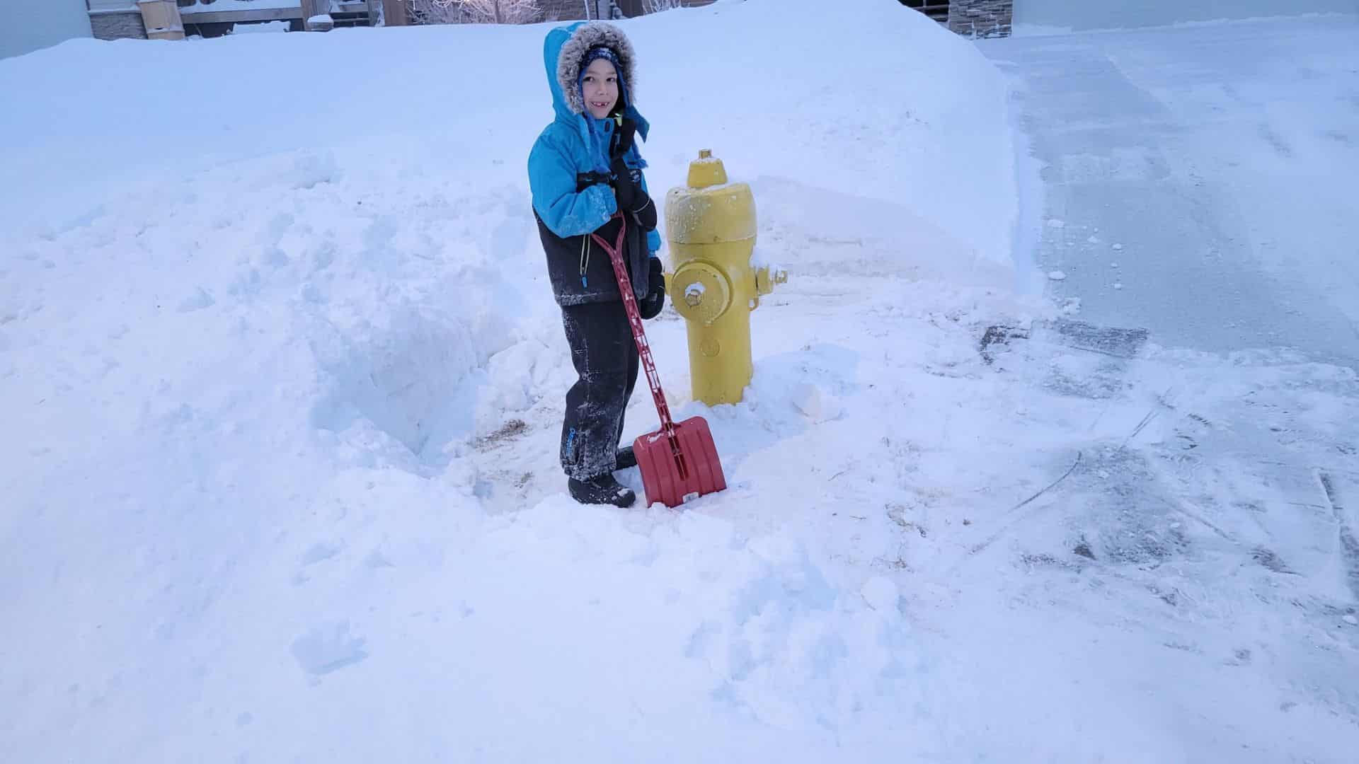 Kid after clearing snow around fire hydrant – Energeticcity.ca