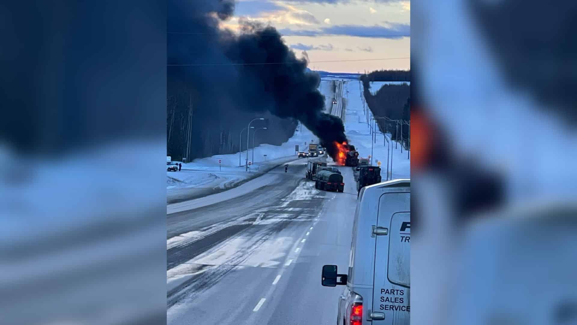 No injuries after semi-truck hauling crane caught on fire on Highway 97