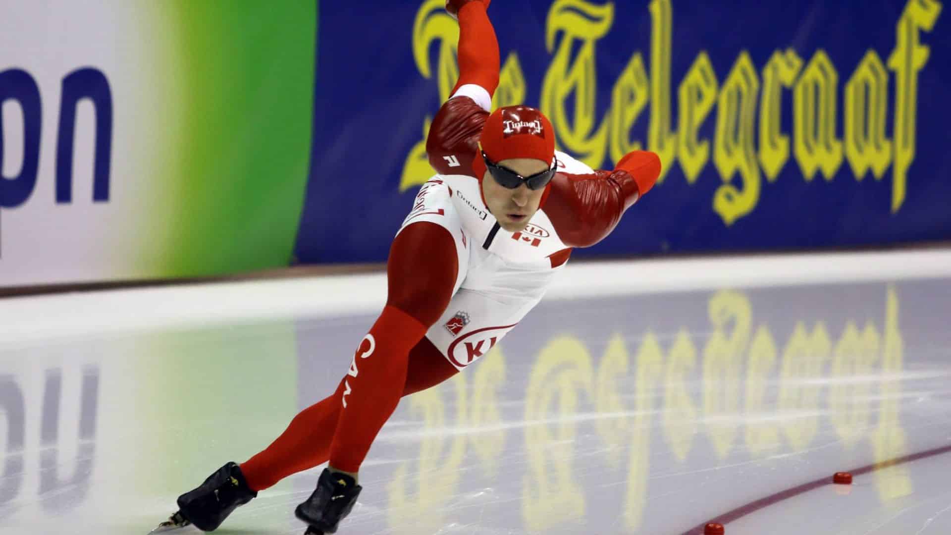 Speedskater Denny Morrison gives Olympic medal to Gilmore Junio